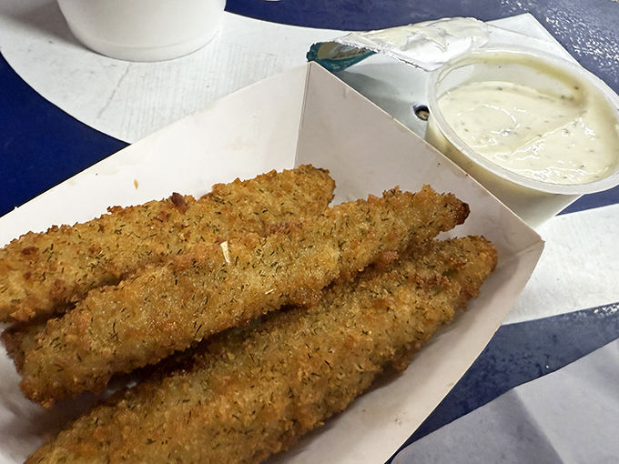 Fried pickle spears&mdash;the unsung heroes of the side dish world. Crispy, tangy, and paired with a dip that makes you wonder why you'd eat pickles any other way.