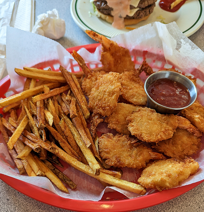 Golden-fried shrimp and hand-cut fries—the kind of basket that makes you wonder why you ever waste calories on fancy food.