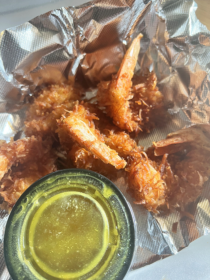 Golden-fried shrimp with a dipping sauce that could make cardboard taste good. Sometimes the simplest pleasures are worth driving across state lines for.
