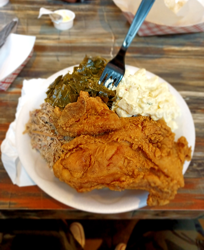 Fried chicken that would make your grandmother both jealous and proud. That golden crust holds secrets only decades of practice can perfect.