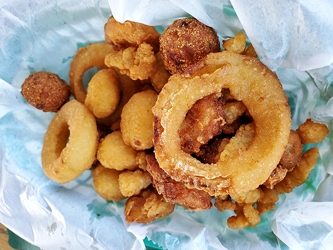 Golden-fried treasures from the deep&mdash;where rings, shrimp, and nuggets of seafood have achieved crispy perfection in a single, shareable basket.