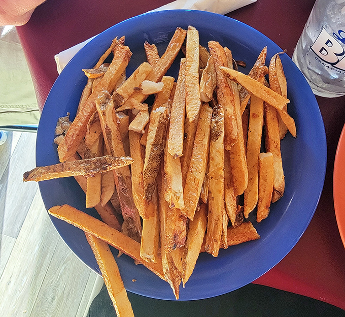The stars of the show &ndash; hand-cut fries with that perfect crispy-outside, fluffy-inside magic that keeps Ohio drivers filling their gas tanks for return trips.