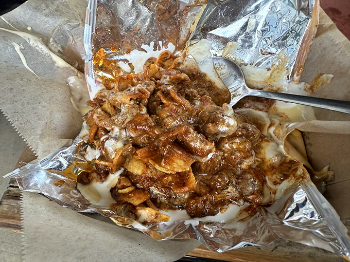 Comfort food engineering at its finest&mdash;layers of savory goodness that would make even the most dignified diner lick the foil clean.