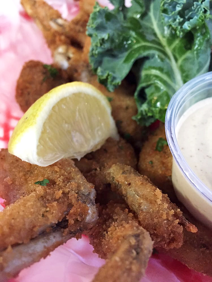 Crispy fried frog legs: where Southern comfort food meets Florida swamp cuisine. Don't knock it until you've tried it—they really do taste like chicken's sophisticated cousin.
