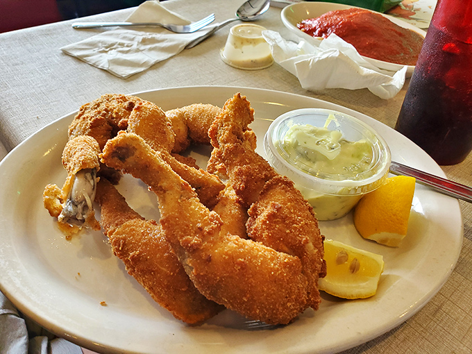 Golden-fried frog legs &ndash; the culinary adventure you didn't know you needed, served with a side of "yes, I'm sophisticated enough to try these."