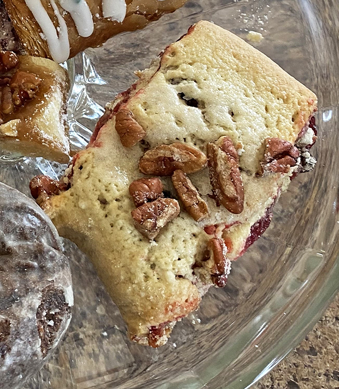 This cranberry pecan square isn't just a baked good&mdash;it's architecture. The perfect ratio of nuts to fruit creates a textural symphony that Mozart would have appreciated.