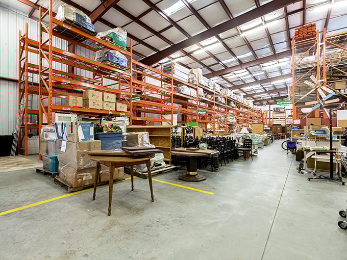 Industrial shelving reaches skyward, storing tomorrow's possibilities. The warehouse organization puts some retail operations to shame.
