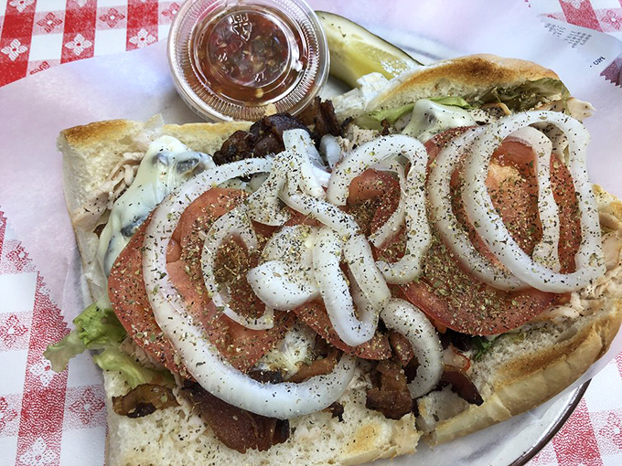 The Reuben &ndash; where corned beef, sauerkraut, and Russian dressing perform a harmonious dance that would make Broadway choreographers jealous. Pure sandwich symphony. 