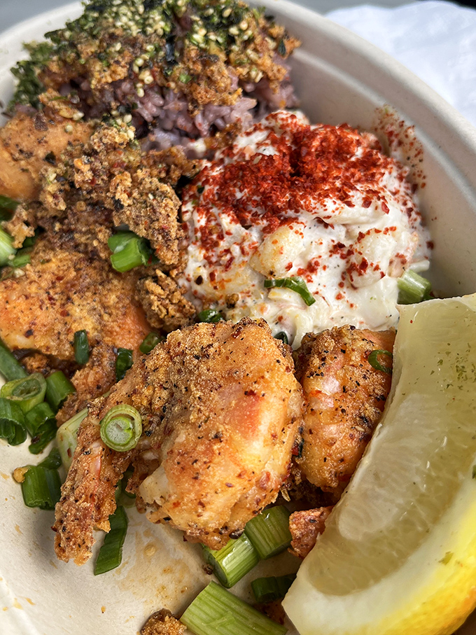 Crispy, succulent morsels dusted with furikake and green onions—proof that sometimes the simplest preparations create the most profound flavor memories.