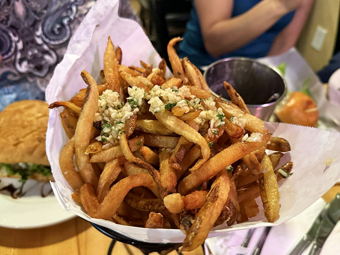 Garlic fries topped with blue cheese&mdash;because sometimes regular fries just aren't living their best life. These are what regular fries dream of becoming.