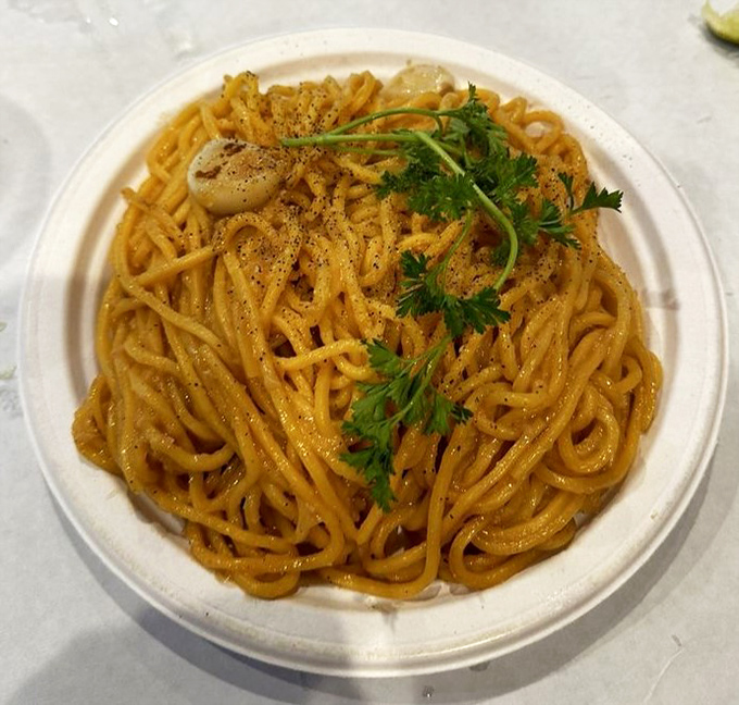 Garlic noodles that would make an Italian grandmother nod in approval. The perfect carb companion to your seafood feast.