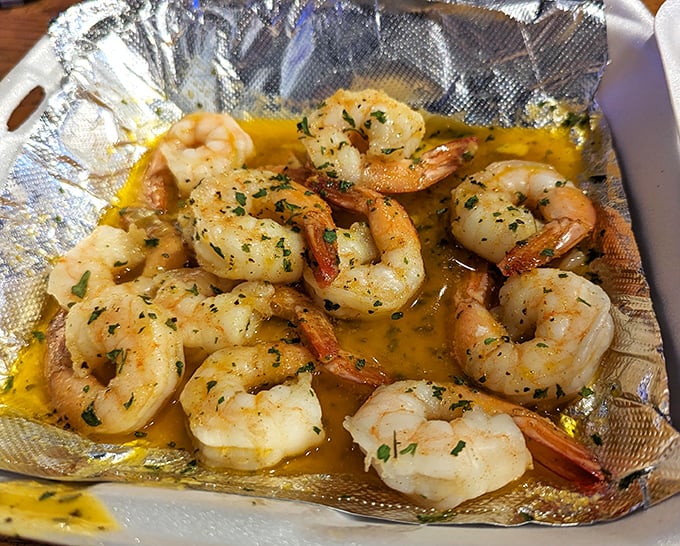 Plump shrimp swimming in a buttery sea of garlic and herbs&mdash;proof that sometimes the simplest preparations yield the most profound flavors.