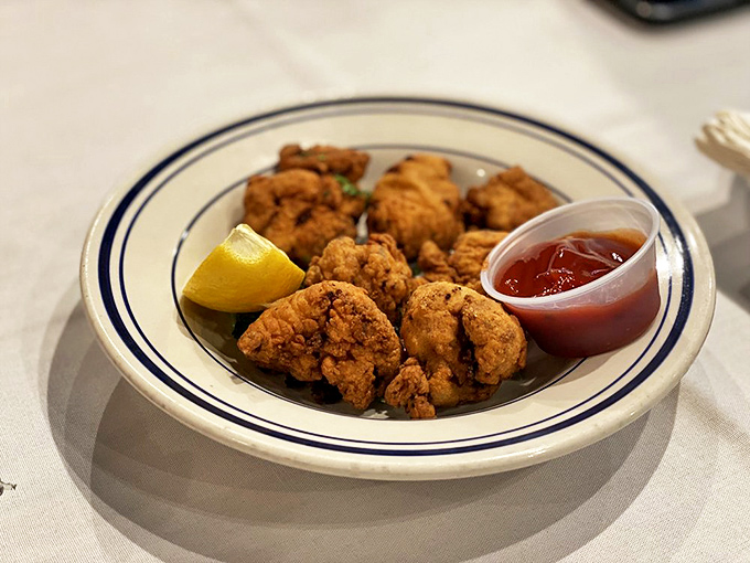These chicken wings aren't playing second fiddle to seafood – they're crispy, juicy flavor bombs that prove Blue Water Bay takes everything on their menu seriously.