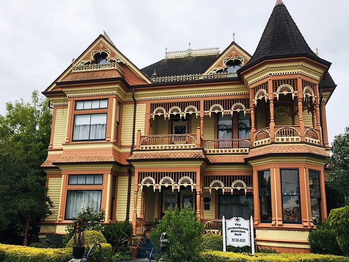 The Gingerbread Mansion isn't just well-preserved&mdash;it's downright showing off with its butter-yellow exterior and intricate wooden detailing.