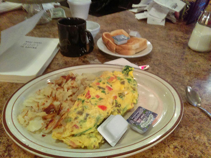 The Greek omelet brings Mediterranean sunshine to your morning plate with feta, spinach, and pure deliciousness.