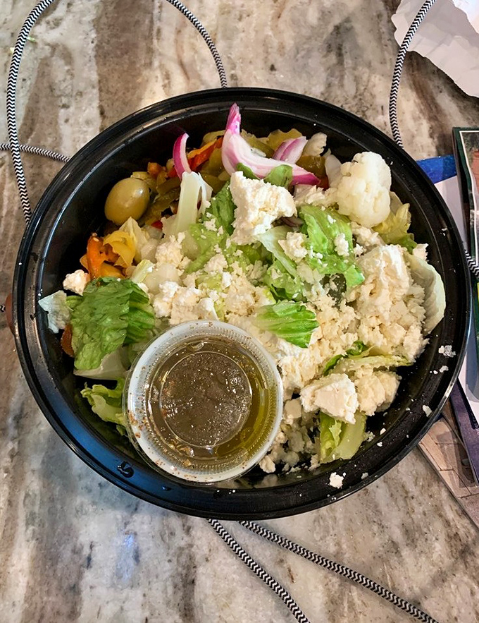 A Greek salad so fresh, Zeus himself might descend from Olympus for a quick lunch break.