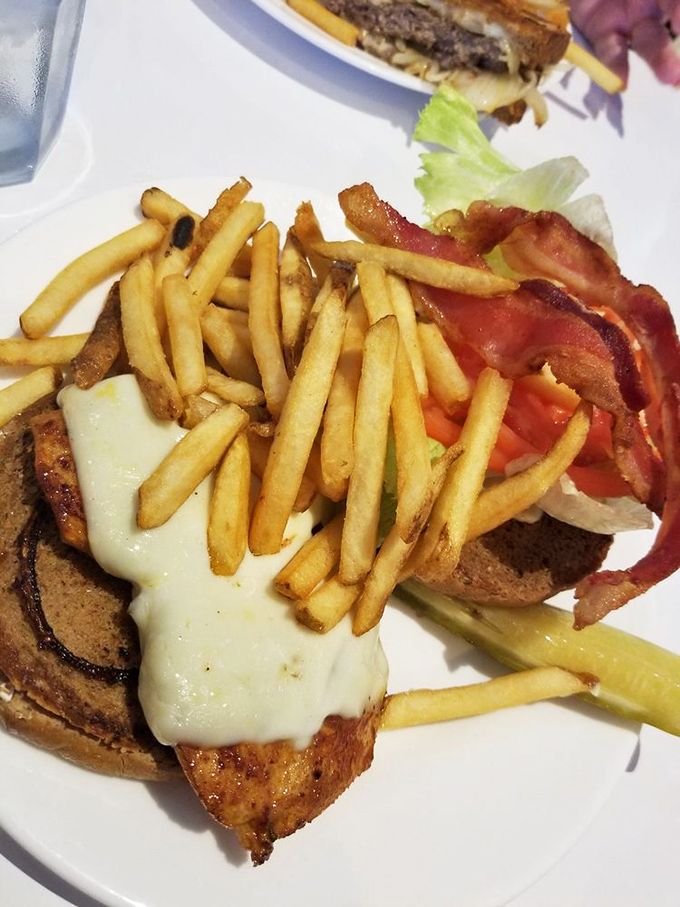 That perfectly toasted bread, melted cheese, and crispy bacon aren't just sandwich components&mdash;they're the holy trinity of lunchtime satisfaction.