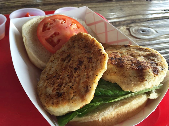 A grilled chicken sandwich that doesn't need fancy aioli or artisanal bread to shine&mdash;just fresh catch, simple seasoning, and the confidence of knowing it's perfect.
