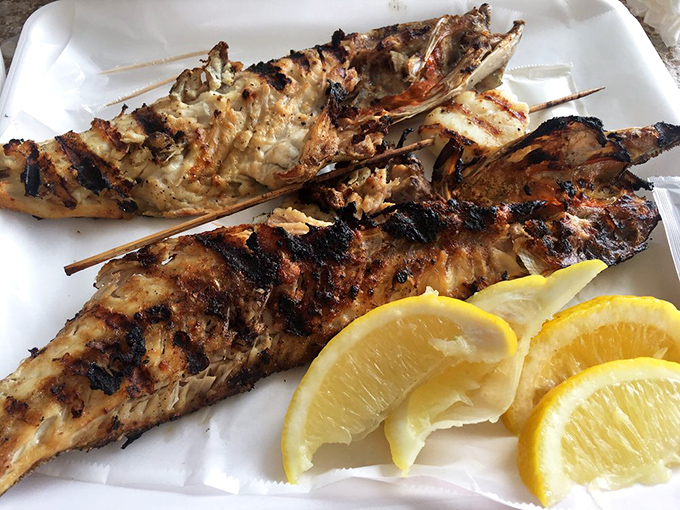 Simplicity at its finest: perfectly grilled fish with lemon wedges. No culinary gymnastics needed when the seafood is this fresh&mdash;just fire, fish, and a squeeze of citrus.