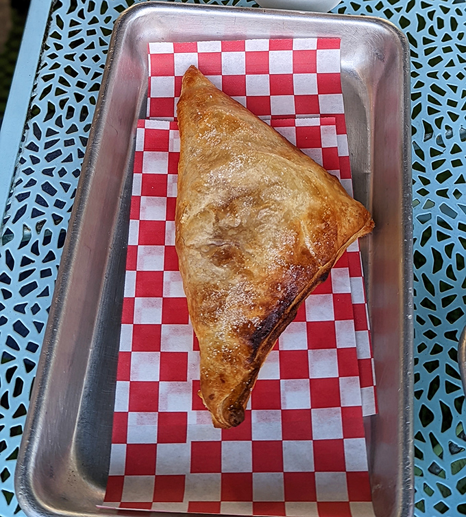 This isn't just a pastry; it's a golden triangle of happiness. The classic guava and cheese pastelito brings Miami flavor to Tampa Bay.