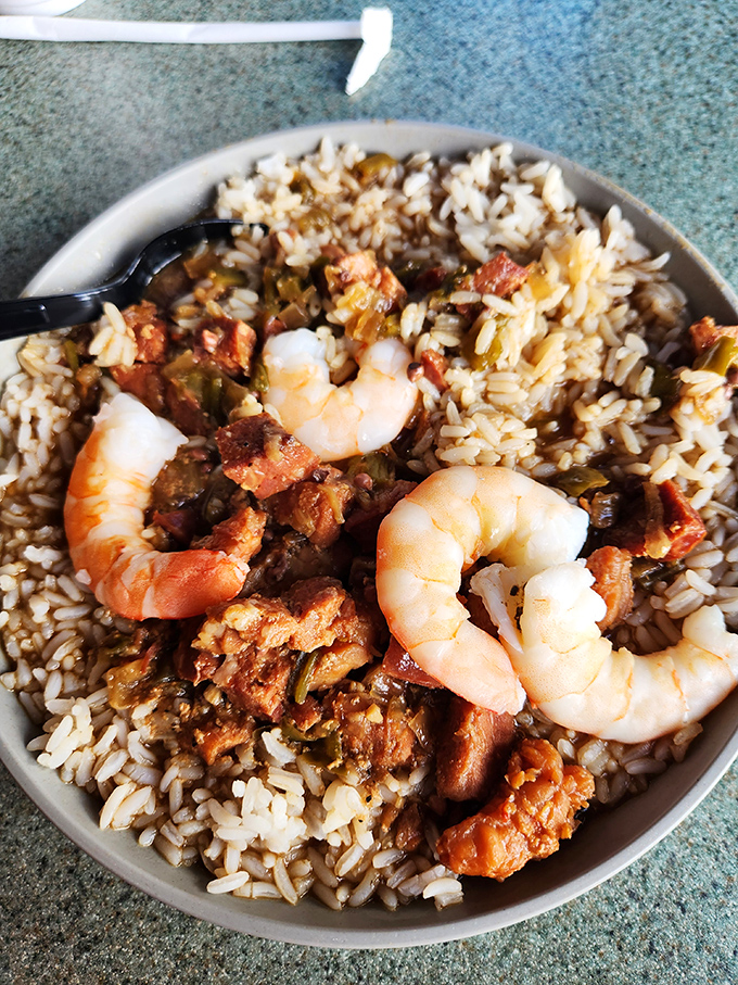 Plump shrimp nestled in savory rice like treasures in a delicious sea. Comfort food with a coastal accent.