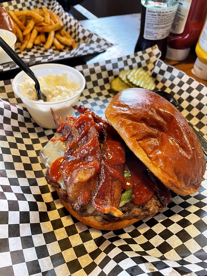 Meet the Gunslinger Burger: where bacon, crispy onions, and barbecue sauce create a flavor standoff that always ends with your taste buds winning.