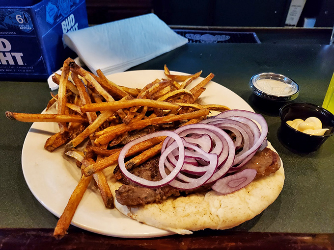 Seasoned meat, fresh toppings, and hand-cut fries that make you wonder why you'd ever settle for drive-thru again. This is sandwich architecture at its finest.
