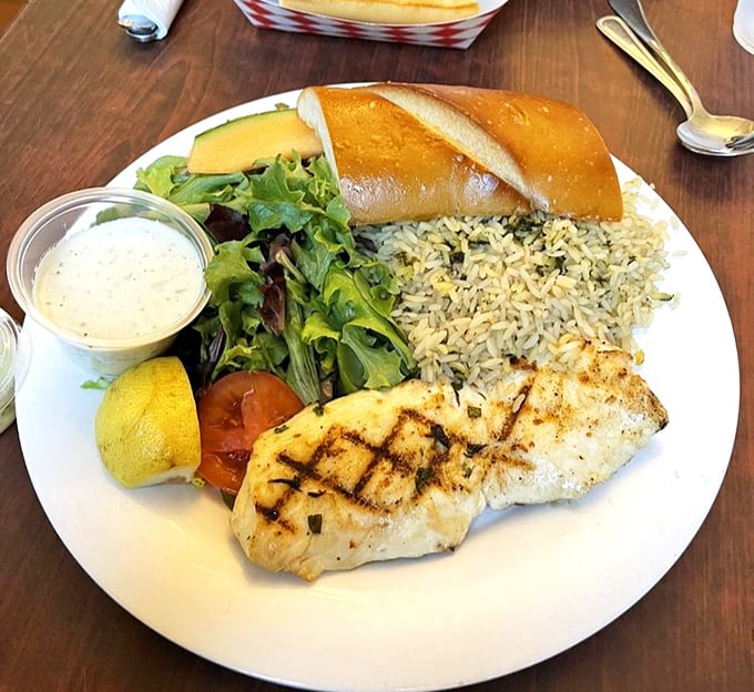 Grilled halibut that flakes with just a glance, served with wild rice that's actually wild about being on the same plate.