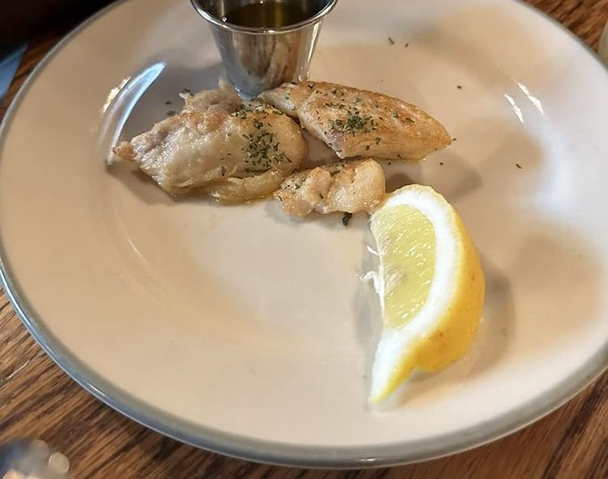 Delicate halibut that proves Ohio knows seafood. Paired with a bright lemon wedge, it's the ocean's finest ambassador to the Midwest.