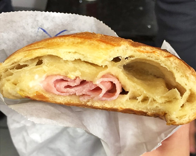 The ham and cheese croissant&mdash;where savory meets flaky in a handheld miracle that makes you wonder why breakfast sandwiches need anything else.