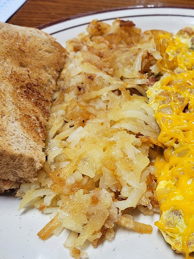 Golden hashbrowns with the perfect crisp-to-soft ratio&mdash;the breakfast equivalent of hitting the lottery. That cheese pull deserves its own Instagram account.