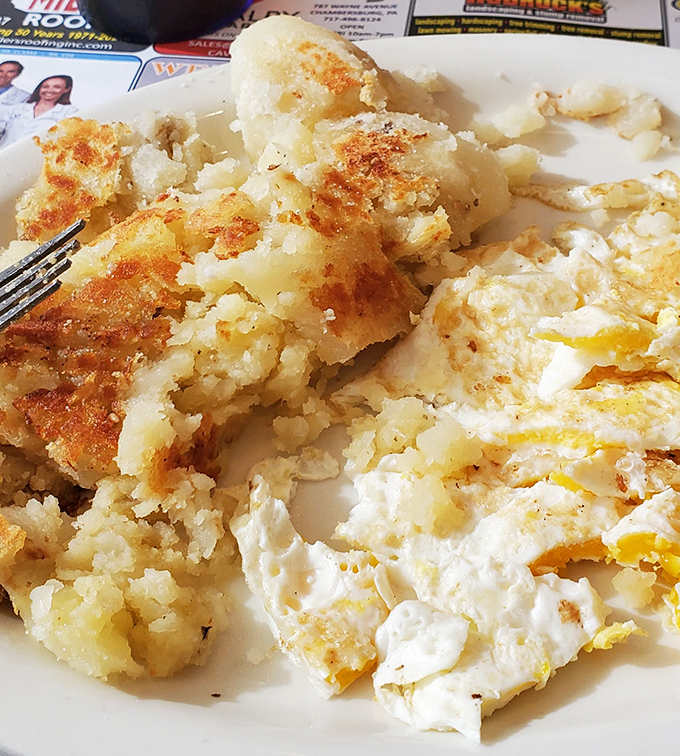 Home fries and eggs—the breakfast equivalent of Astaire and Rogers, dancing together in perfect harmony on a plate of morning possibilities.