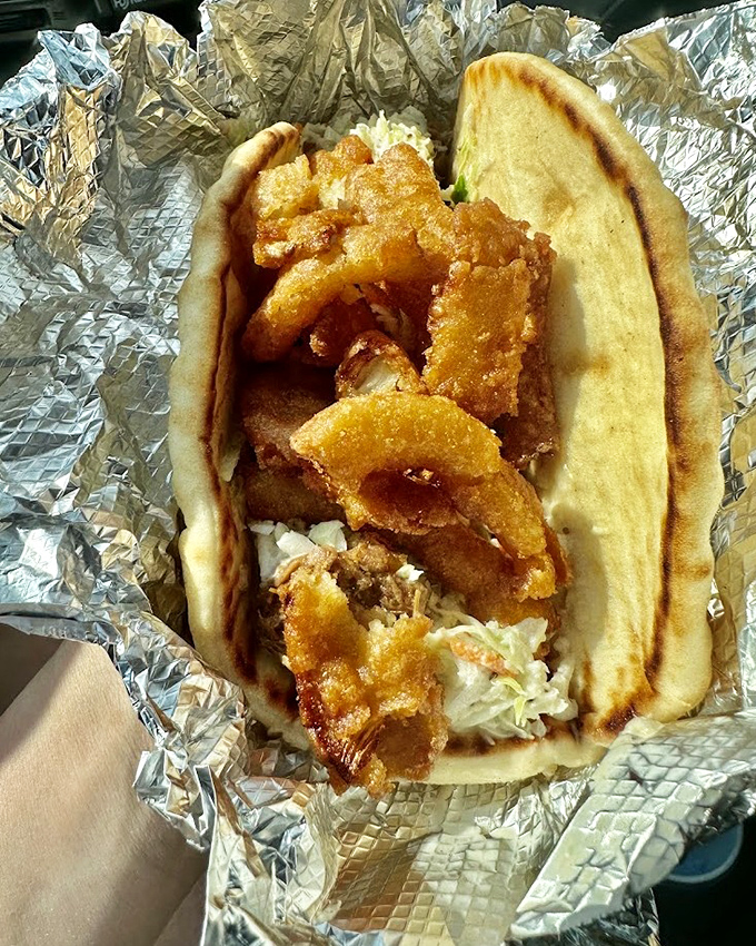 The Hillbilly Wrap: where crispy fish meets soft flatbread in a relationship your taste buds will want to third-wheel.