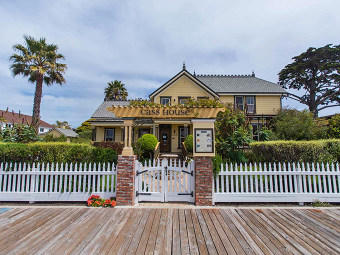 The historic Cass House stands as a Victorian time capsule, its white picket fence practically begging you to slow down.