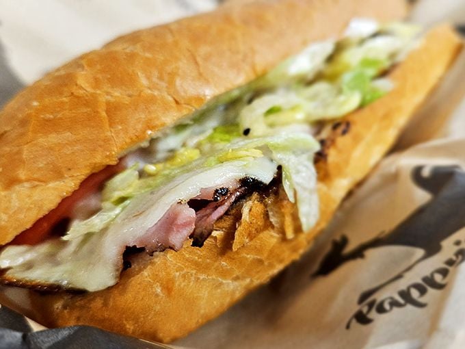 This isn't just a sandwich; it's architecture. Layers of meat, cheese, and veggies creating the Taj Mahal of lunch options. 