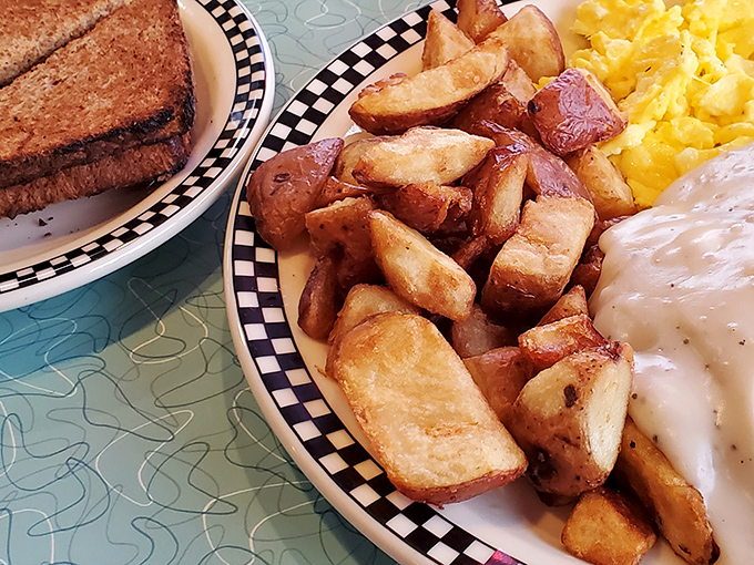 Home fries that achieve the impossible trifecta: crispy edges, tender centers, and seasoning that makes you wonder why potatoes elsewhere even bother trying.