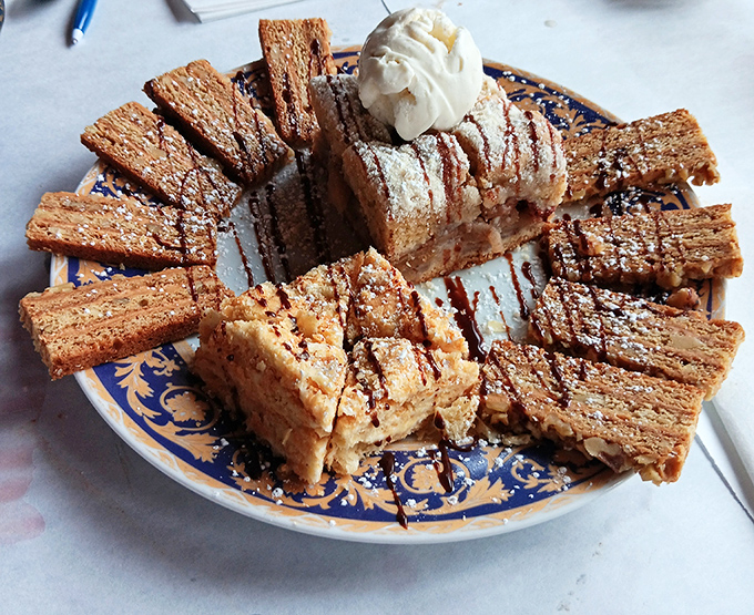 Honey cakes that stack up like sweet golden towers, each layer more tempting than a lottery ticket.