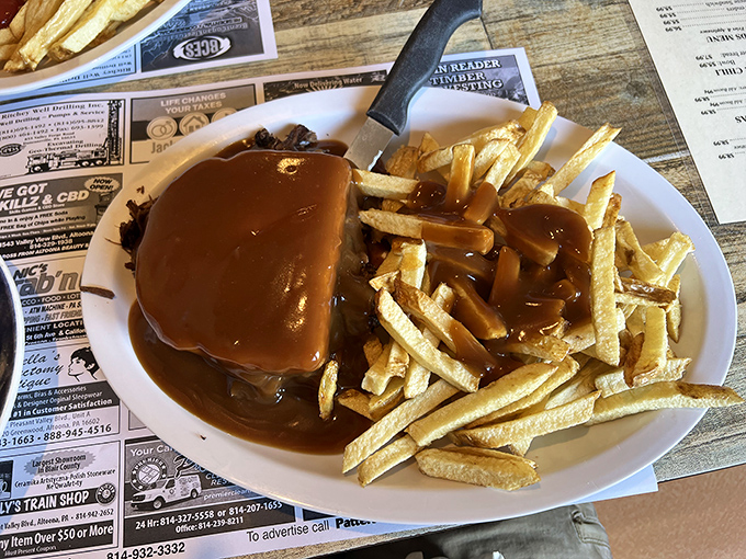 Gravy isn't just a condiment here; it's practically a religious experience. This hot roast beef sandwich could make a vegetarian question their life choices.