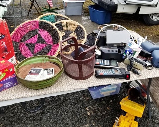Flea market feng shui in action. Colorful baskets neighbor vintage electronics in the kind of retail randomness that makes treasure hunting so addictive.