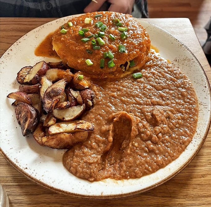 Breakfast with attitude. This hearty plate with its rich sauce and roasted potatoes doesn't just start your day&mdash;it launches it into the stratosphere.