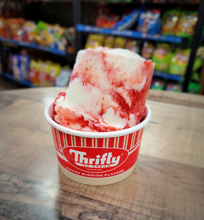 Thrifty ice cream: where nostalgia and brain freeze meet in perfect harmony. The strawberry swirl is like childhood summers in frozen form.