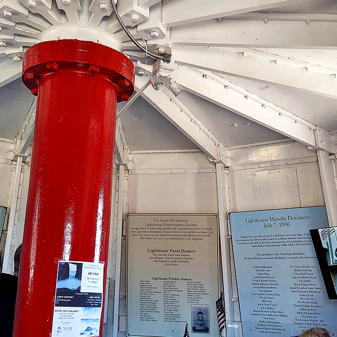 The bright red central column adds a pop of color to the interior, like the architectural equivalent of wearing red lipstick to a black-tie event.
