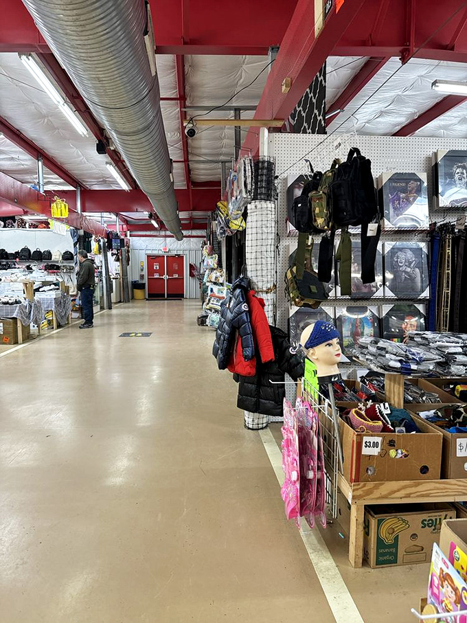 The indoor market's wide aisles and organized chaos invite exploration, with everything from clothing to collectibles hanging from the industrial ceiling.