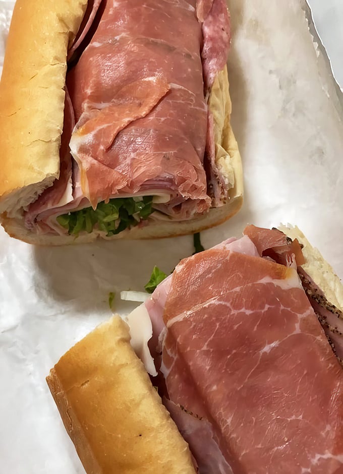 This Italian sub isn't just a sandwich; it's an architectural marvel of cured meats and provolone that would make any nonna nod in approval.