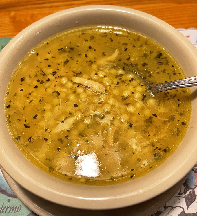 Little pasta pearls and tender chicken swimming in golden broth. Like liquid sunshine that somehow tastes like someone's grandmother made it just for you.