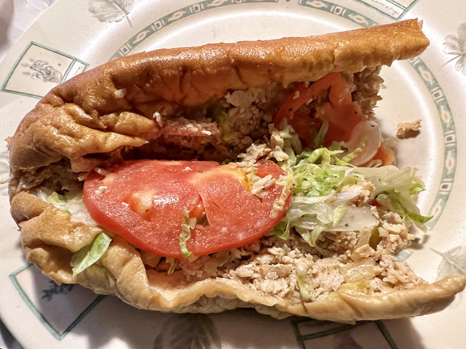This Italian hoagie isn't just a sandwich; it's an architectural marvel of meats, veggies, and bread that demands respect with every bite.