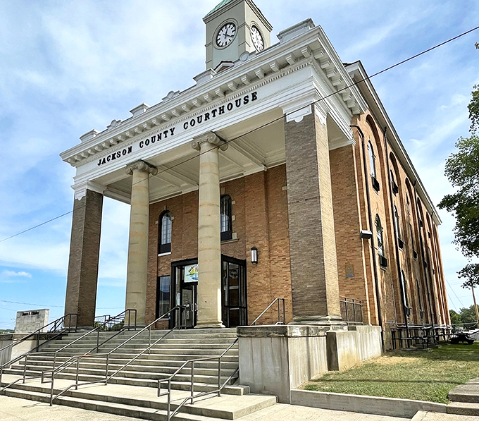 Jackson County Courthouse commands respect with its imposing columns and clock tower, reminding us that small-town justice comes with architectural gravitas.