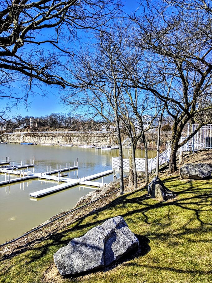 Winter's bare branches frame the marina's peaceful off-season slumber&mdash;a reminder that even vacation spots need their own vacations occasionally.