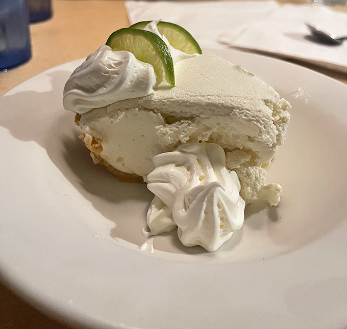 Key lime pie in Florida isn't just dessert, it's practically a constitutional right. This slice delivers the perfect pucker-to-sweet ratio.