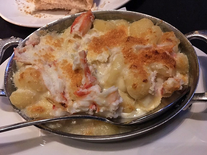 Lobster mac and cheese that makes you question every pasta decision you've ever made. Worth driving across state lines for this creamy, decadent masterpiece.